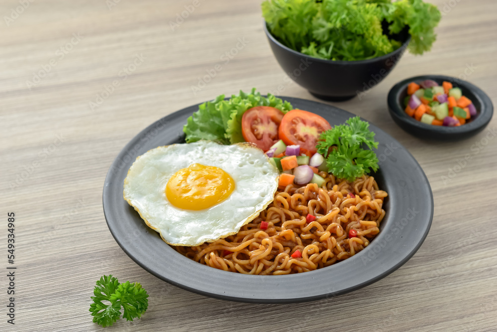 Indomie goreng Indonesian Popular Instant fried Noodle. Served with ...