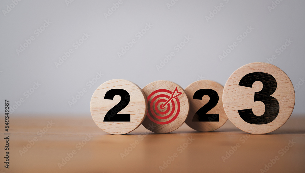 2023 year and target board print screen on wooden block cube for setup ...