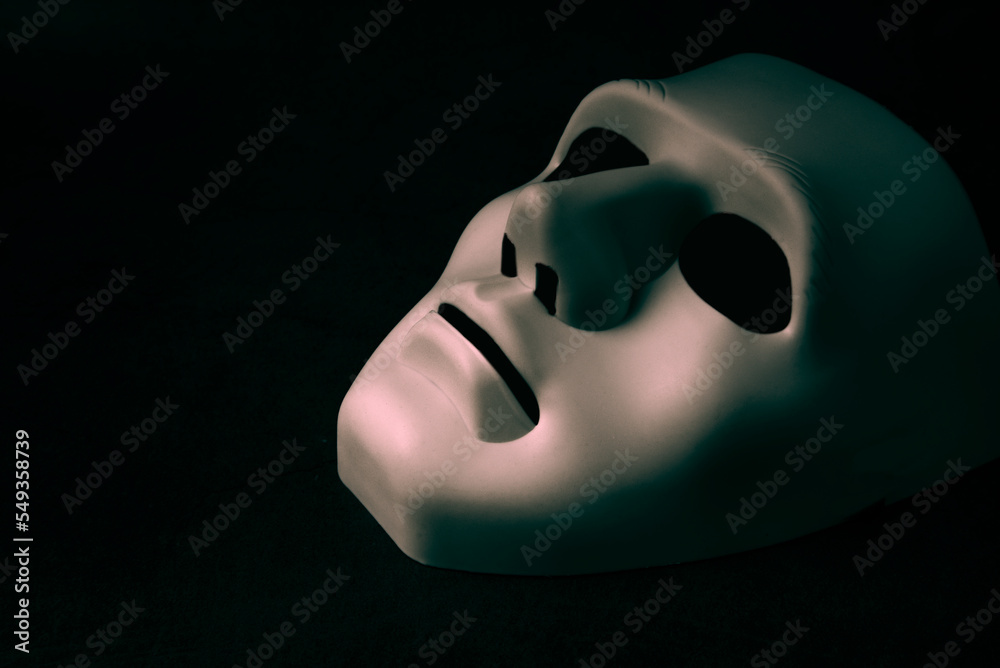 A white mask on a black background is the symbol of the attacking ...