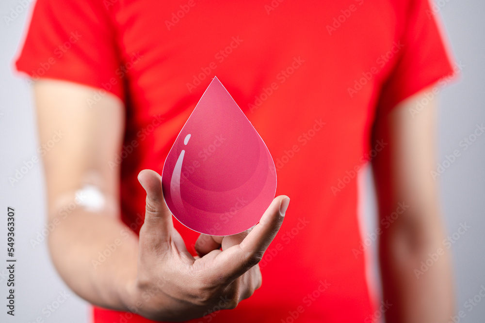 man hands holding donation blood paper cut, blood transfusion, world ...