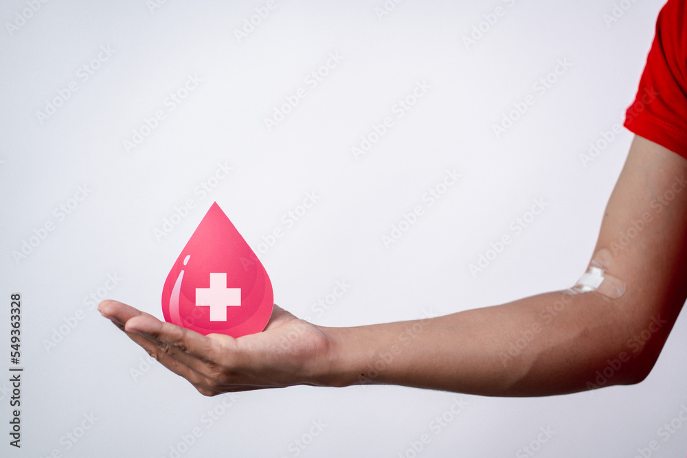 Fotka „man hands holding donation blood paper cut, blood transfusion ...