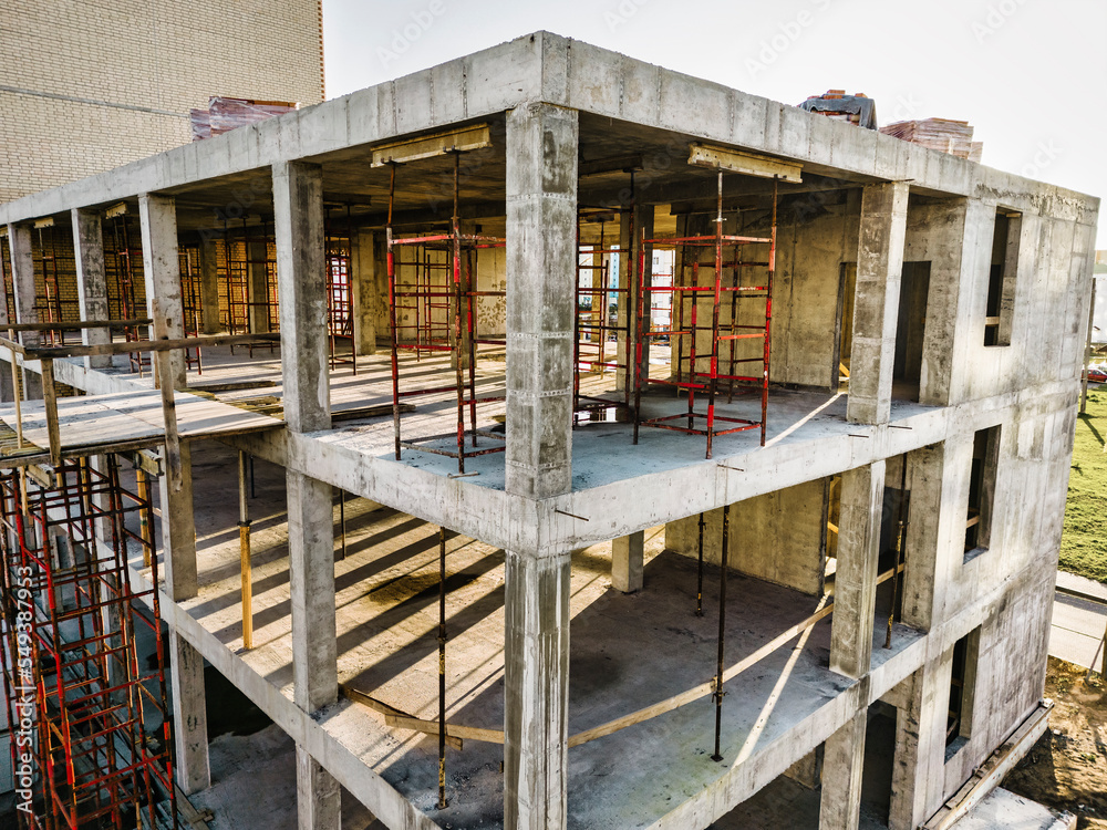 Construction of a monolithic reinforced concrete house. Close-up of a ...