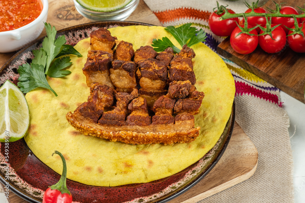 Deep fried pork belly pieces, crispy pork skin appetizer. Tartilla ...