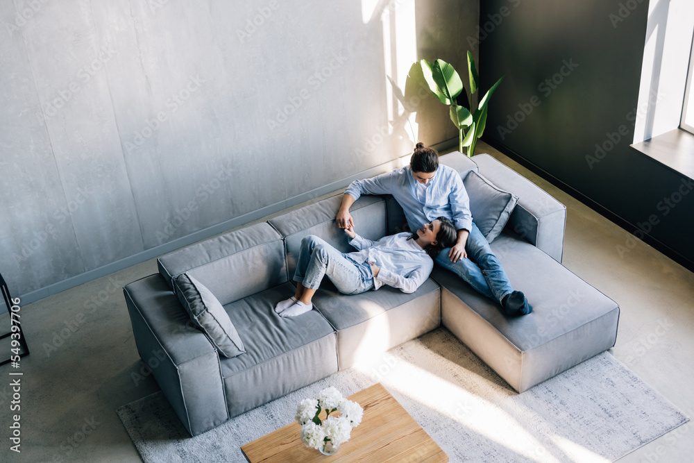 Foto de Free time together. Happy beautiful couple is spending weekend ...