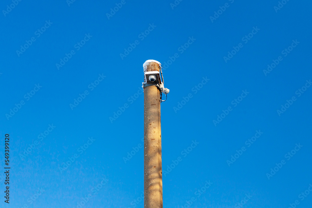 Autonomous video surveillance system installed on a concrete pillar ...