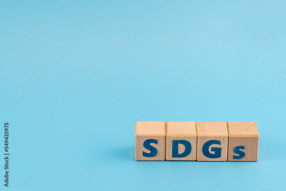 SDGs - sustainable development goals word concept on cubes Stock Photo ...