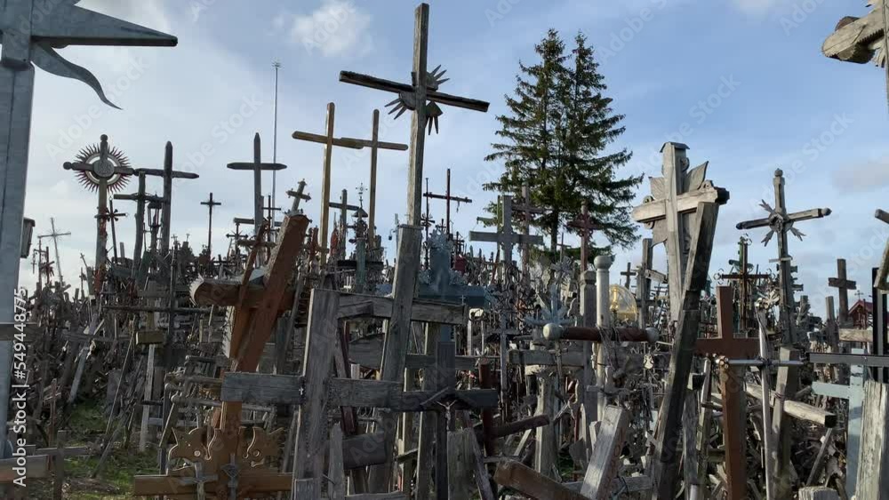 A lot of different sizes wooden and metal crosses on Hill of Crosses ...