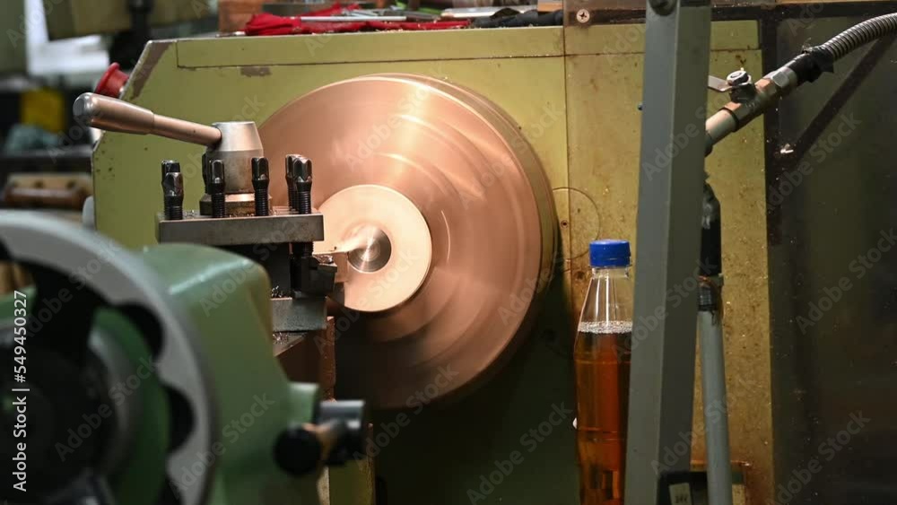 Pan scene the lathe machine finish cut the metal parts by lathe tools ...