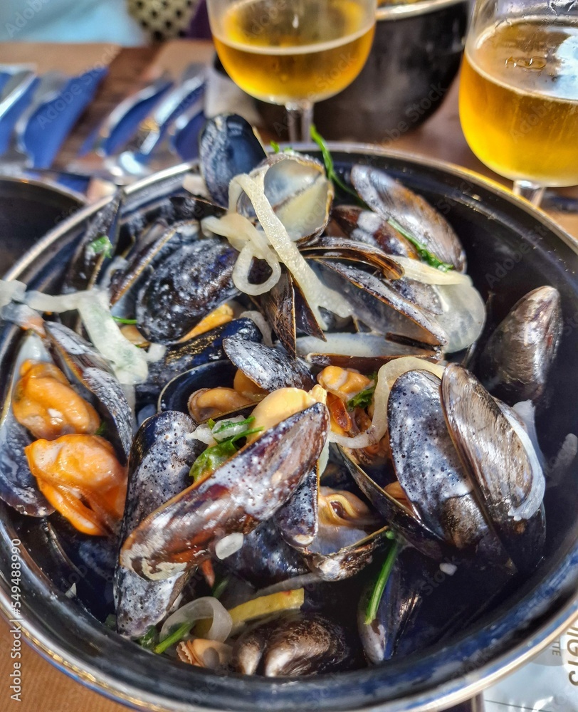 Stewed mussels in cream sauce. A typical lunch in the Normandy region ...