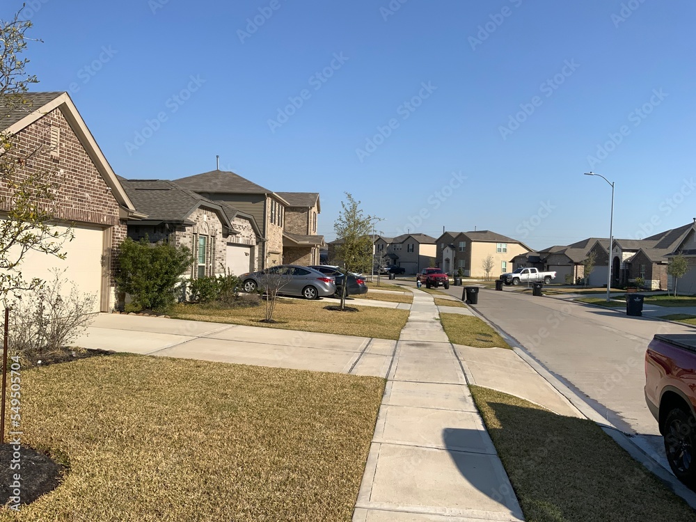A view of a typical middle class american neighborhood street view with ...