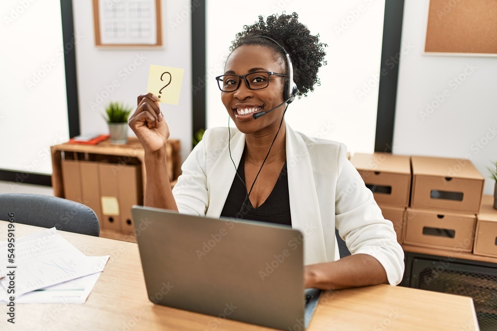 African american woman call center agent smiling confident holding ...