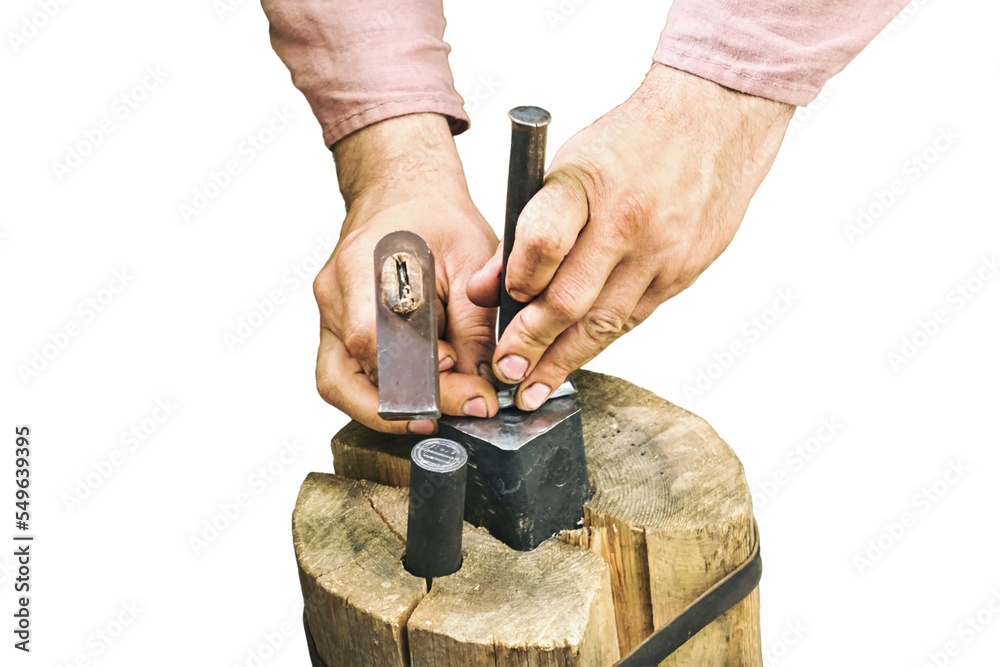 Production of medieval coins by casting and forging, isolated on a ...