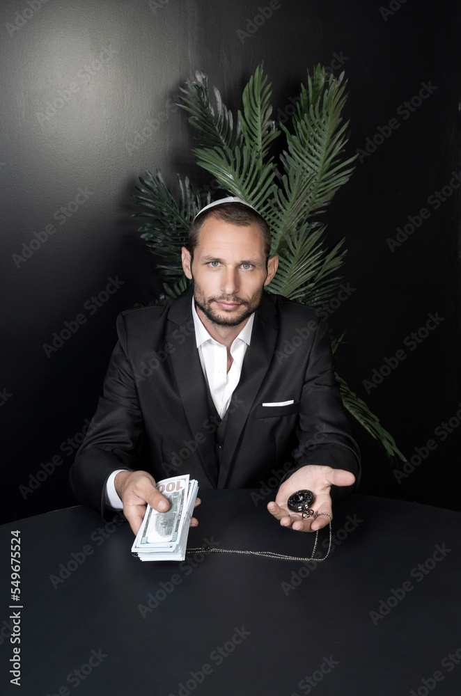 Vertical photo of caucasian Jew israeli office worker holding a stack ...