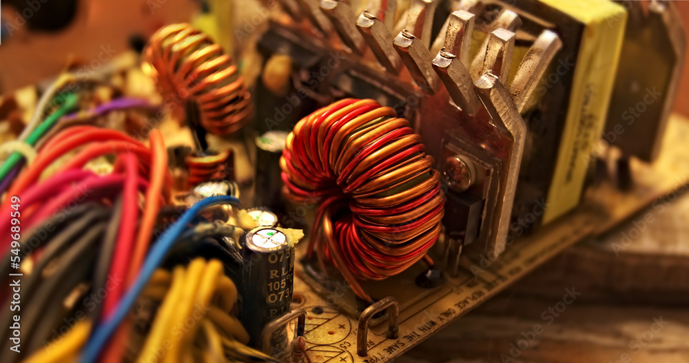 internals of a computer power supply. smoothing inductors in the output filters of power ...