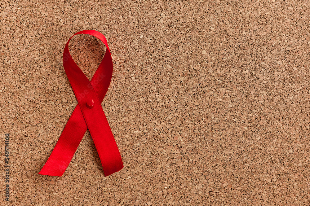 Background for World AIDS Day. Red ribbon as a symbol of struggle ...