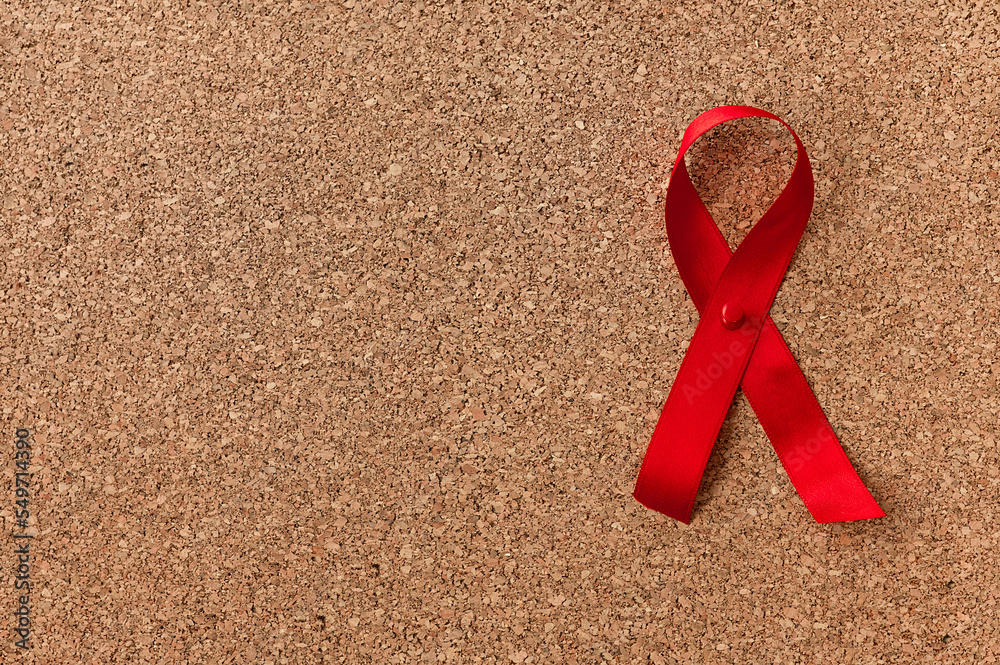 Background for World AIDS Day. Red ribbon as a symbol of struggle ...