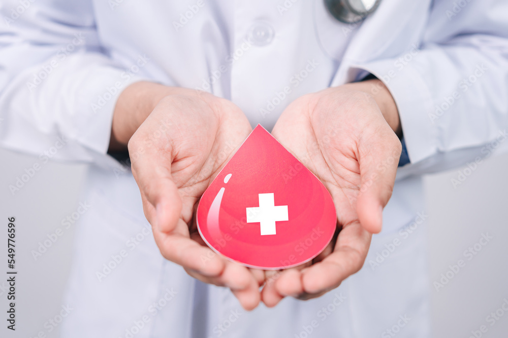 doctor in a white coat receive blood donation, blood transfusion, world ...