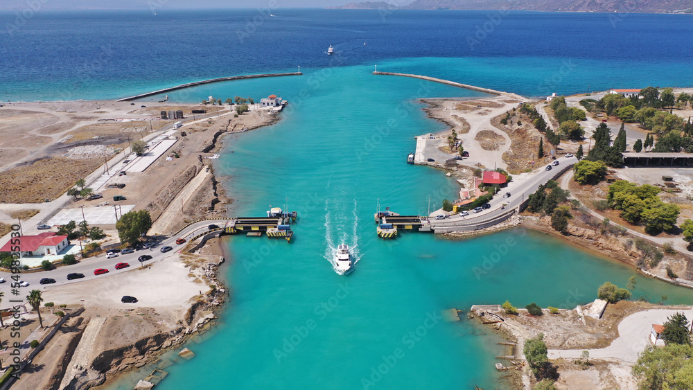 Aerial drone photo of yacht crossing narrow Corinth canal of Isthmus ...
