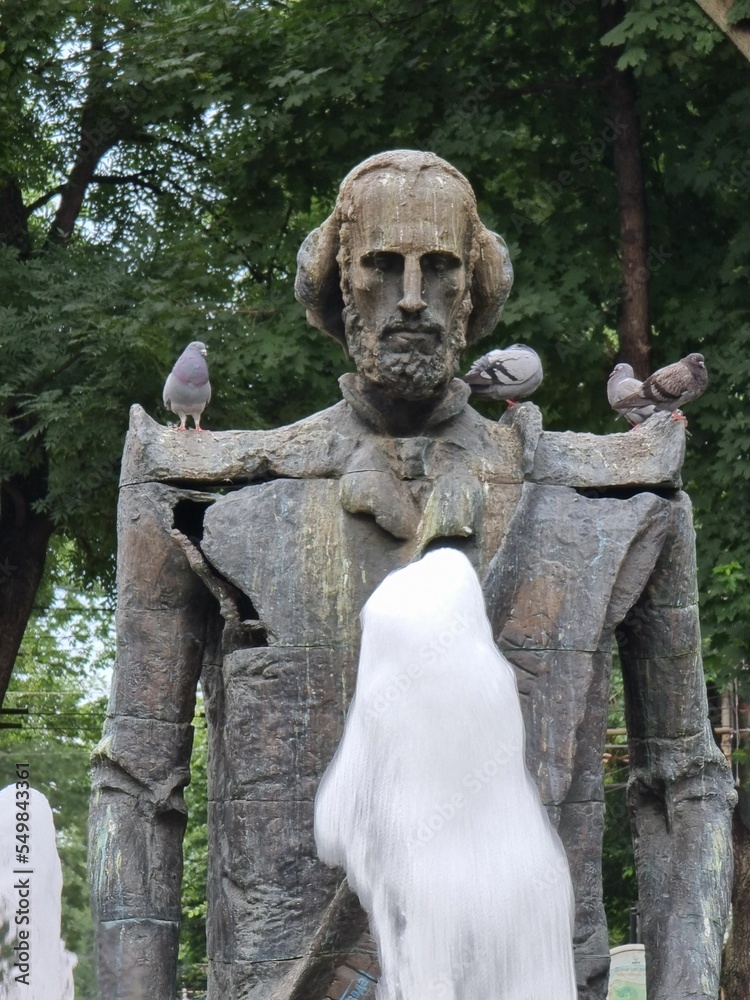 Fountain on the square in Bucharest with a sculpture of Nicolae ...
