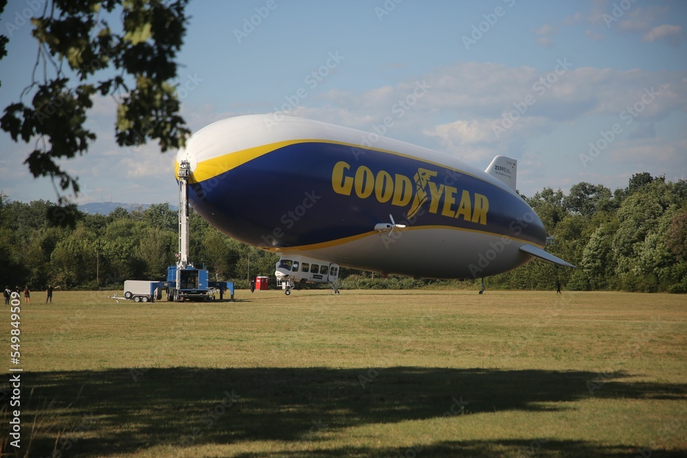 Year Blimp in stationary ground position outside race event at ...
