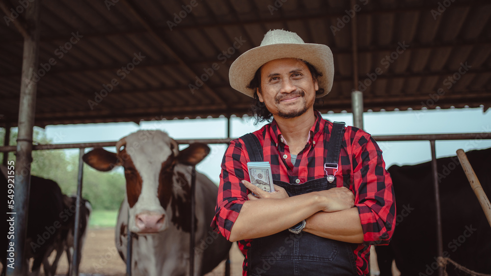 smiling and happy farmers get income from the dairy farm. Agriculture ...