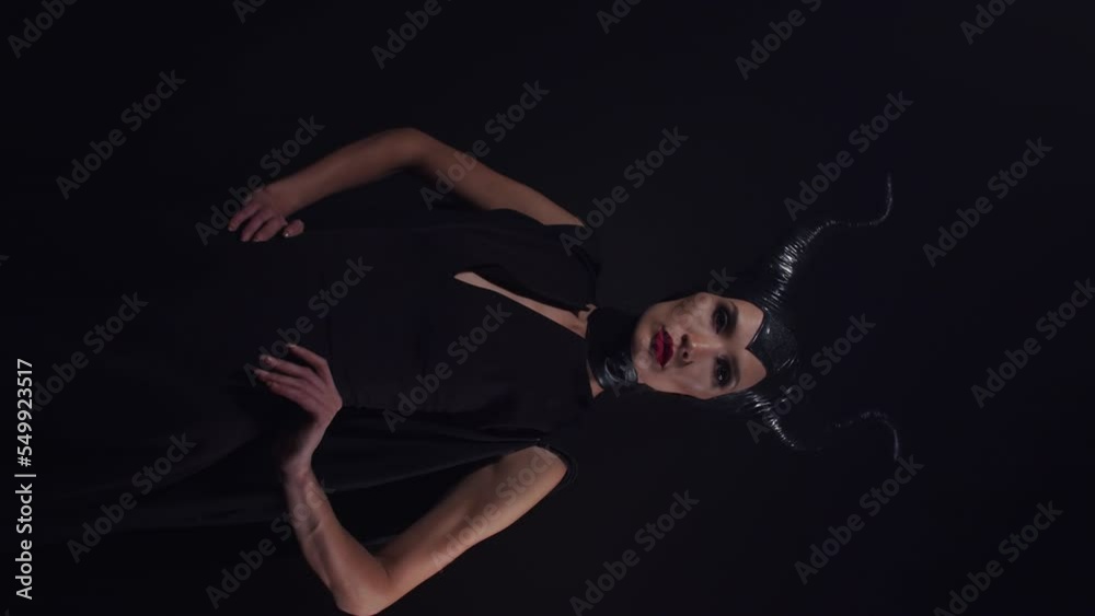 Vertical video An evil beautiful female witch-villain from a fairy tale ...