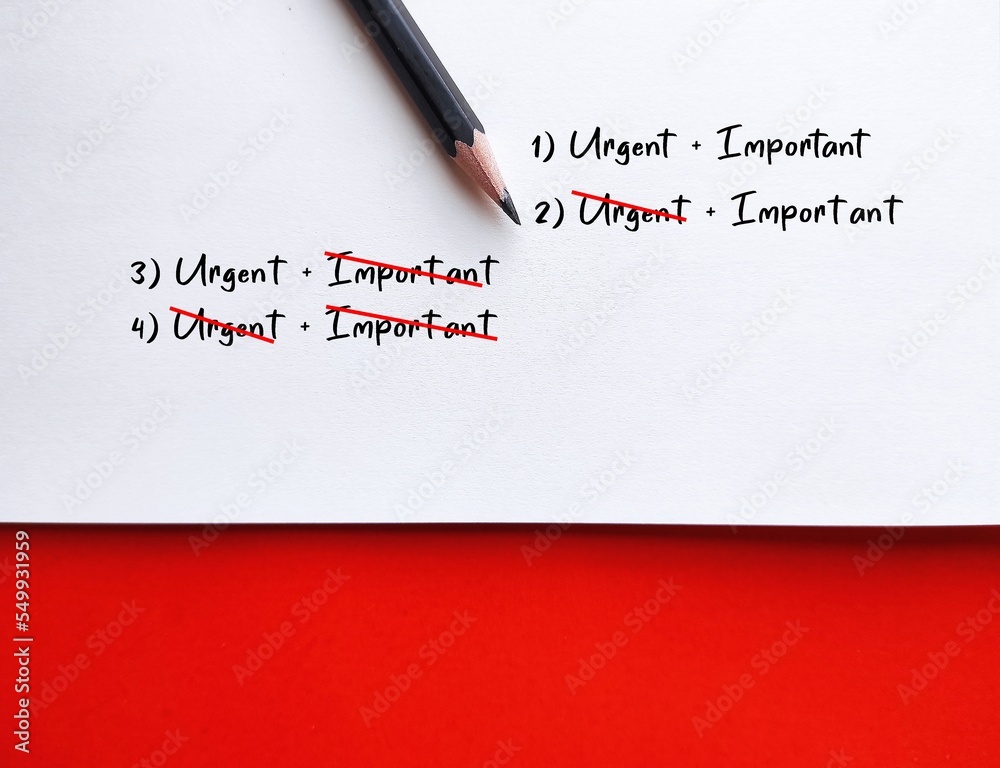 Pencil on note paper on red background with text Urgent+Important ...