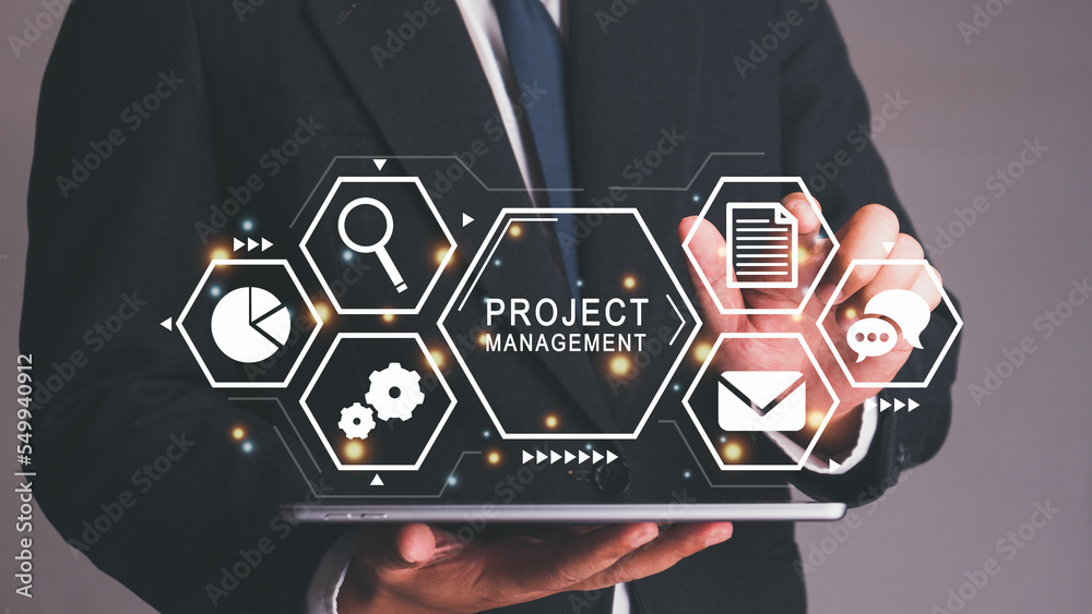 Management diagram on tablet screen with person coordinating teamwork ...