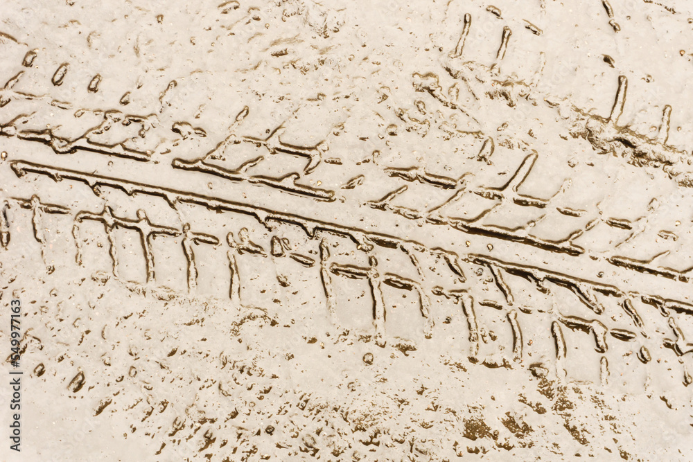 Tyre mark background. Tire track shape. Trail lines on dry brown sand ...