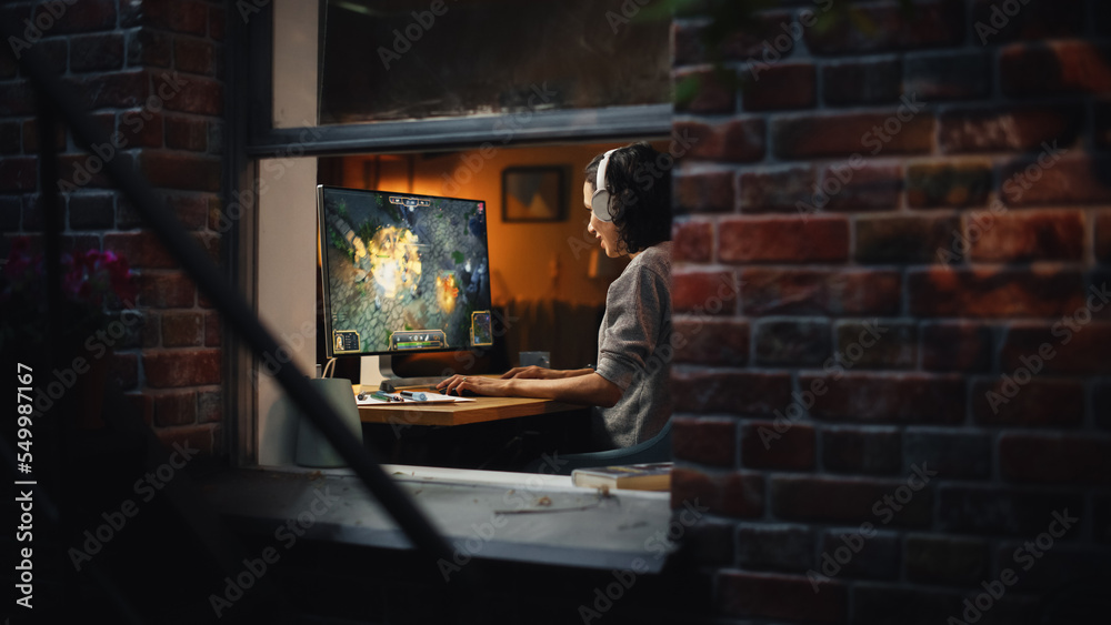 Focused Hispanic Female Gamer Plays RPG Video Game in Online ...