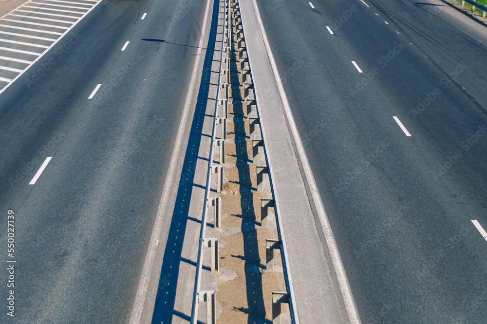 Highway with road signs. A road interchange to ensure safety when ...