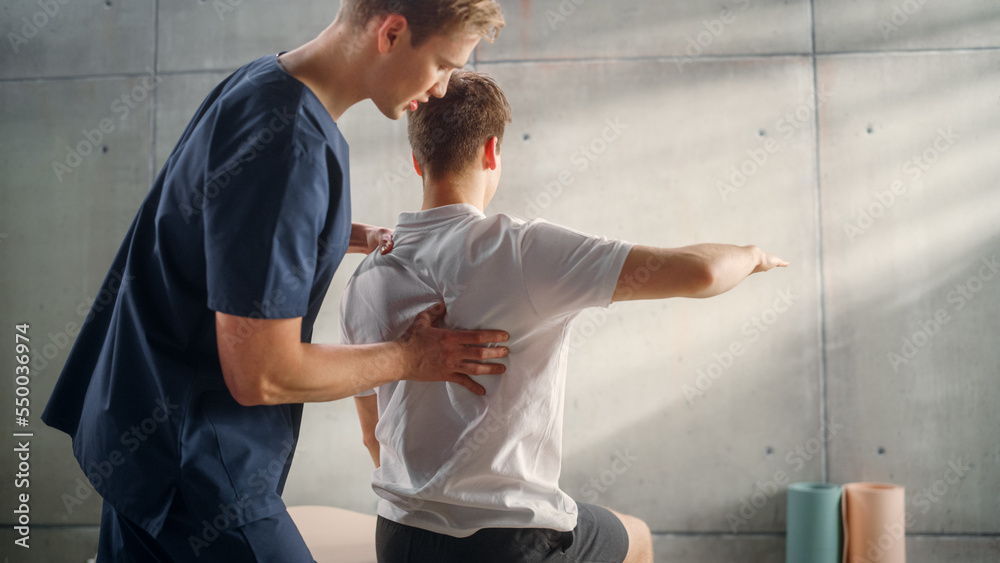 Professional Sport Physiotherapist Working on Specific Muscle Groups ...