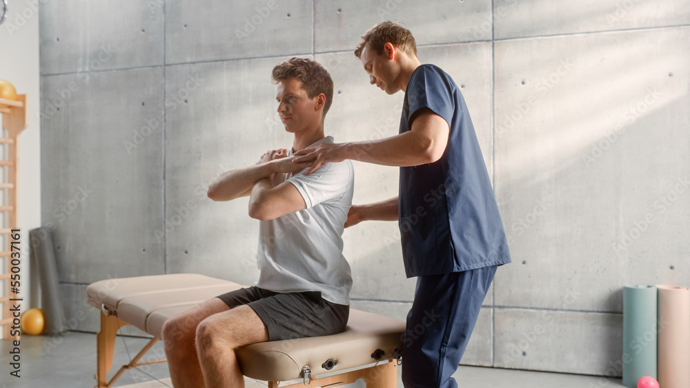 Professional Sport Physiotherapist Working on Specific Muscle Groups ...