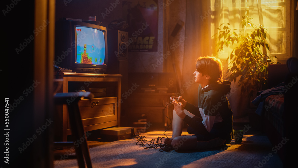 Handsome Child Playing Eight Bit Arcade Video Game on a Console at Home ...