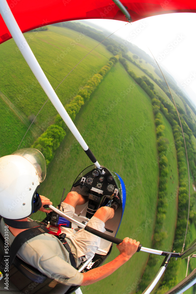 In-cockpit view of a man flying his Airborne Classic ultralight trike ...