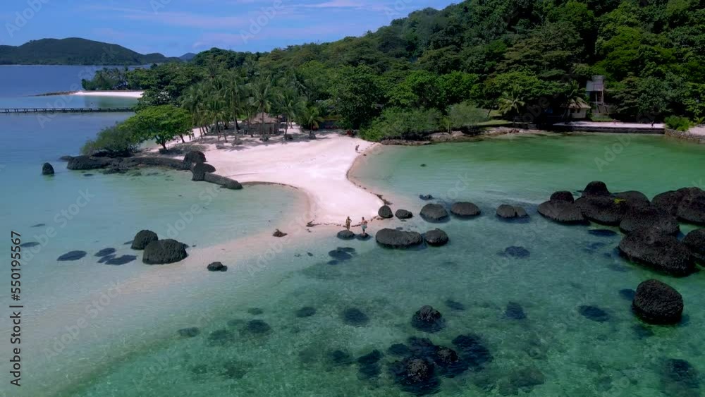 Drone view at Couple man and women on a tropical island in Thailand ...