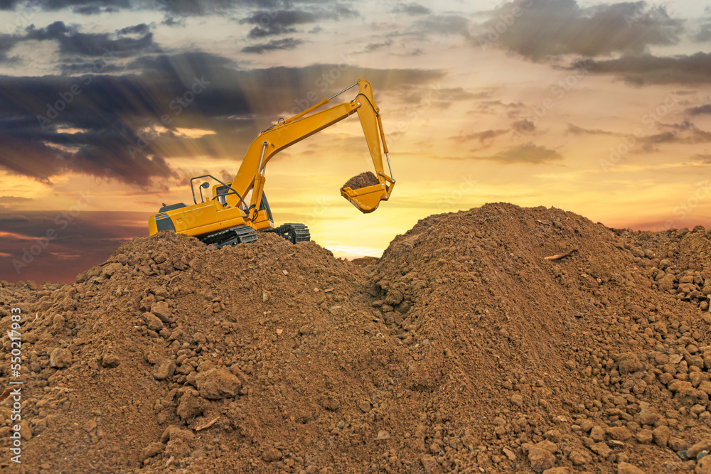Crawler Excavators are digging the soil in the construction site on the ...