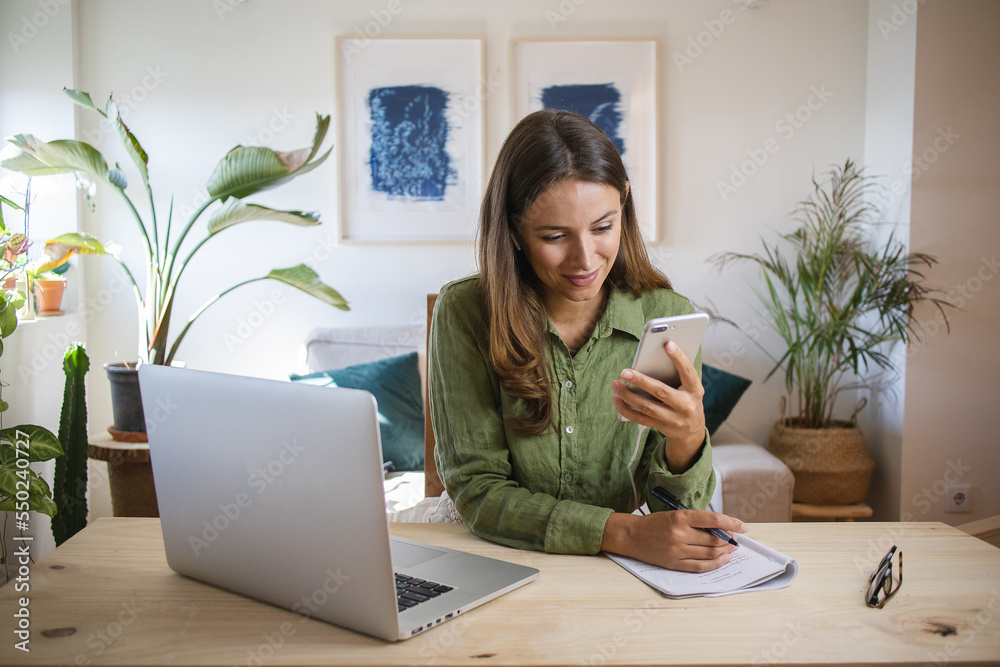 Woman procrastinating on social media while working from home Stock ...