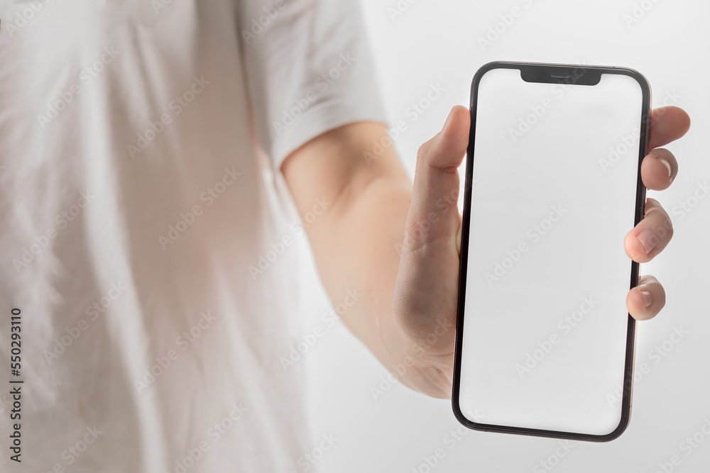 Hand holding Smartphone iPhone and isolated on white background for ...