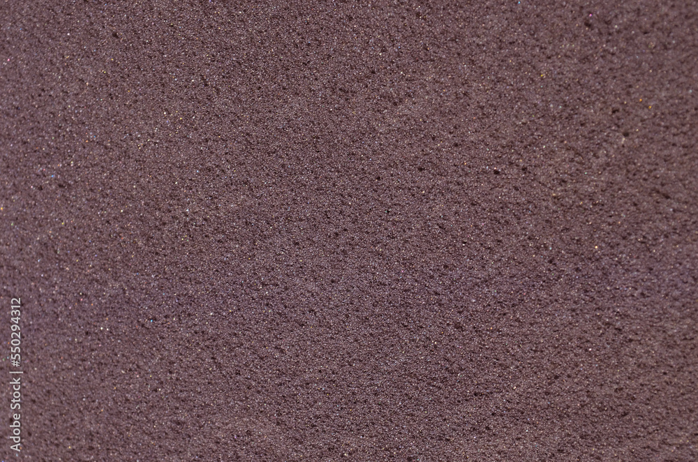 surface texture background of brown sponge foam material with rough ...