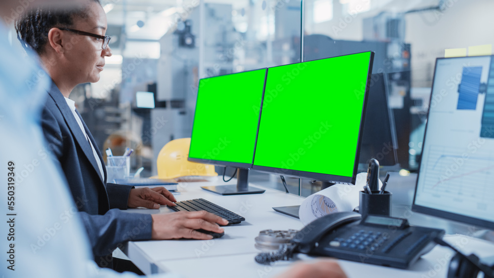 Factory Office Facility: Industrial Engineers Drafting Blueprints of a ...