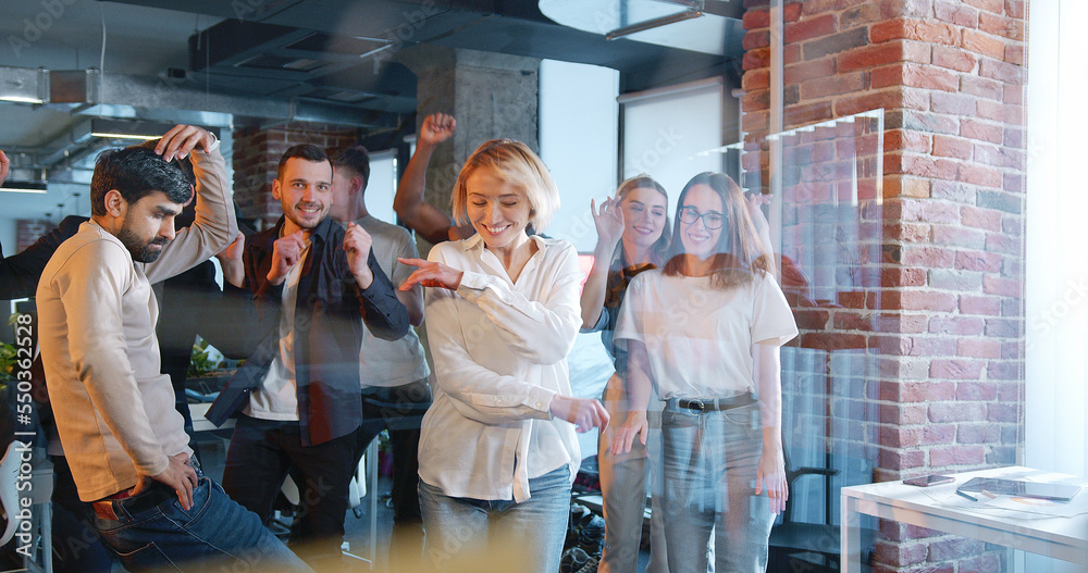 Diverse people celebrating end of working week in office. Multiethnic ...