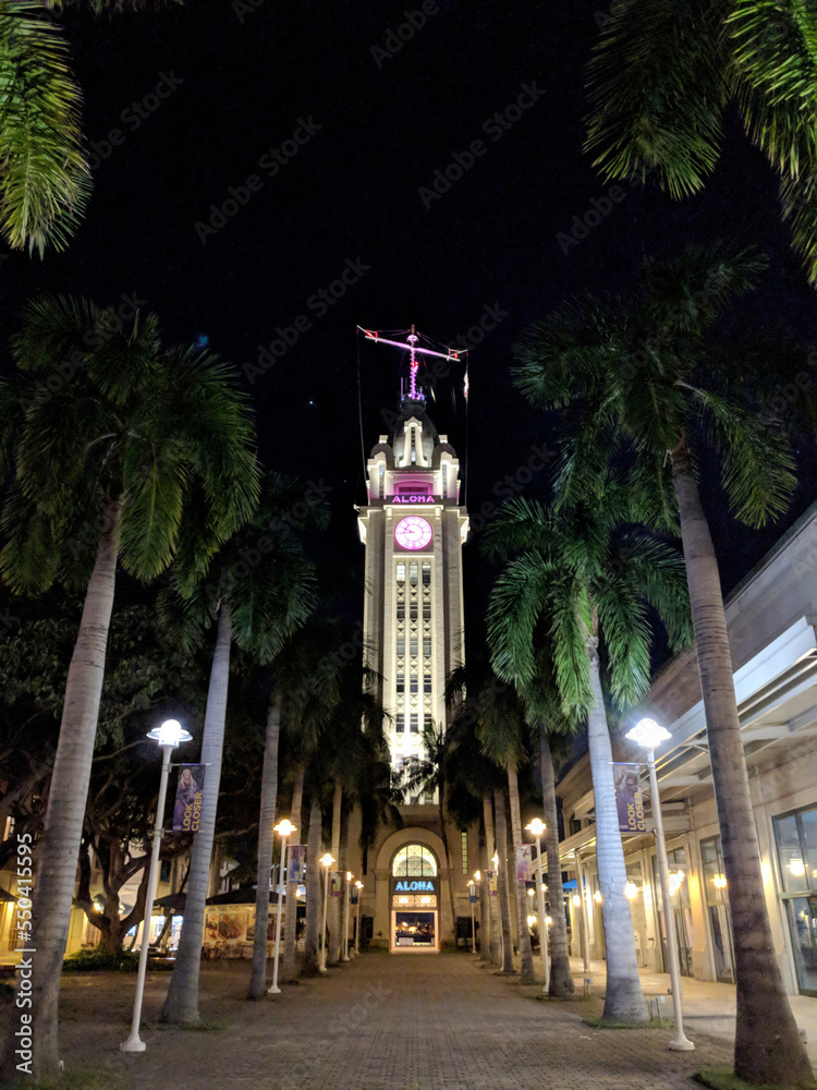 Pathway to Aloha Tower at Night which is light up in Pink Stock Photo ...