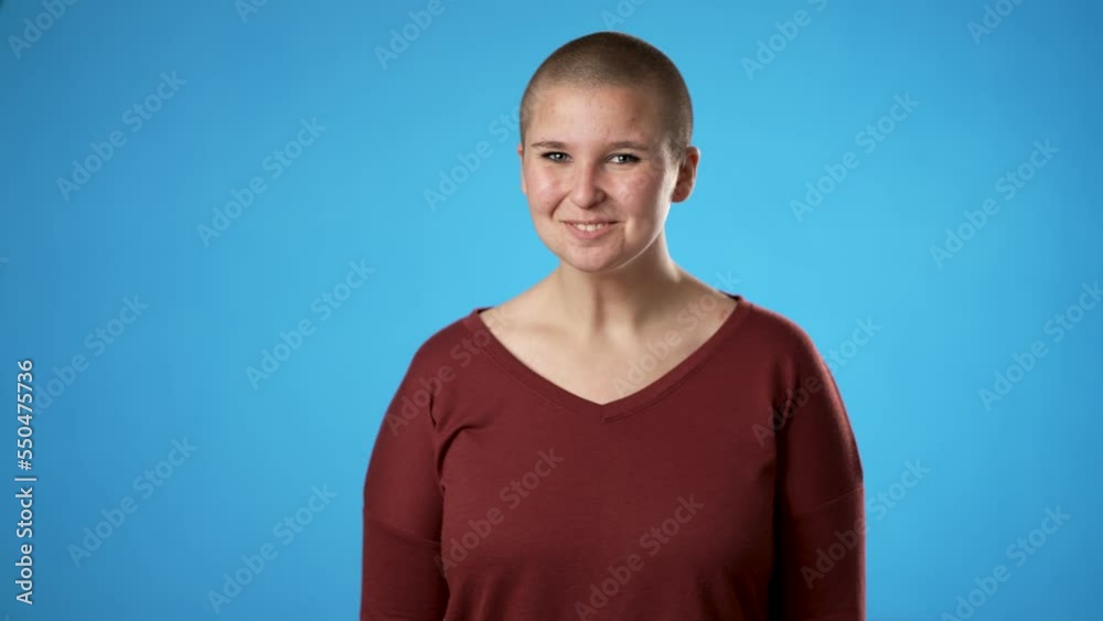 Smiling nod head look around pretty gender fluid non binary young woman ...