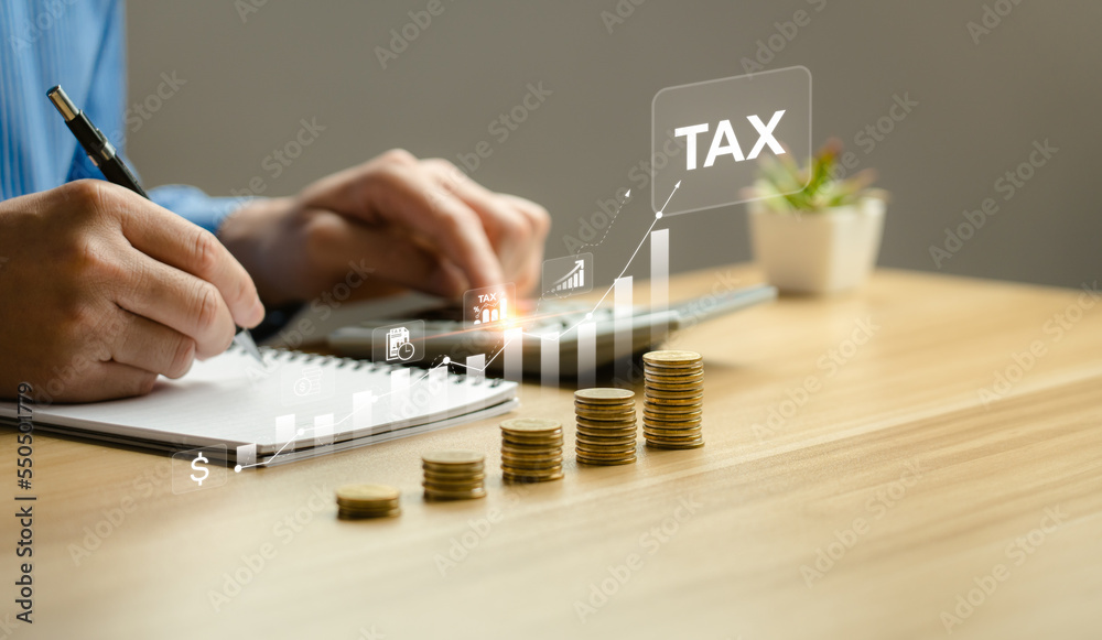 Businessman calculating personal income tax list. Tax deduction ...