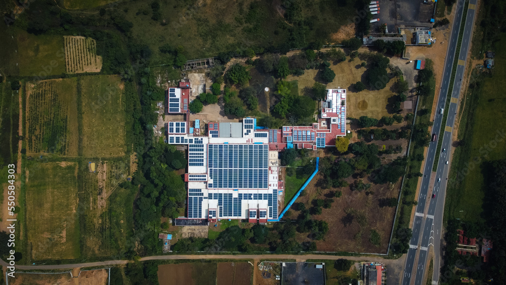 Energy self-sufficient factory using solar rooftop and battery energy ...
