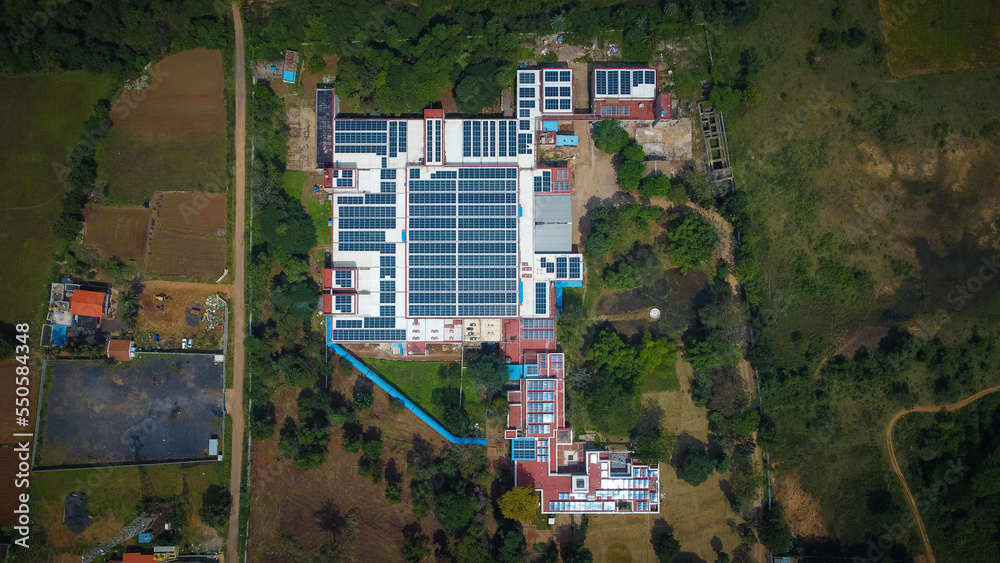 Energy self-sufficient factory using solar rooftop and battery energy ...