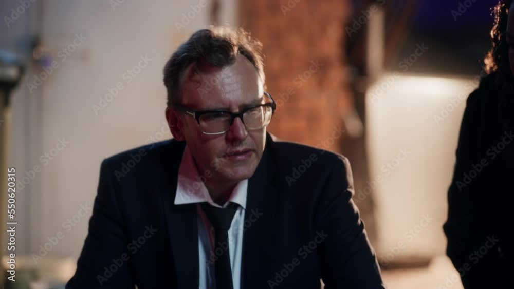 Portrait of Two Police Detectives Working on a Case at Night by ...