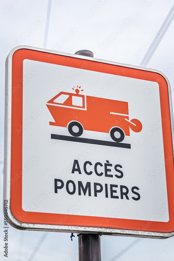"Fire department access" french street sign at the entrance of a fire ...