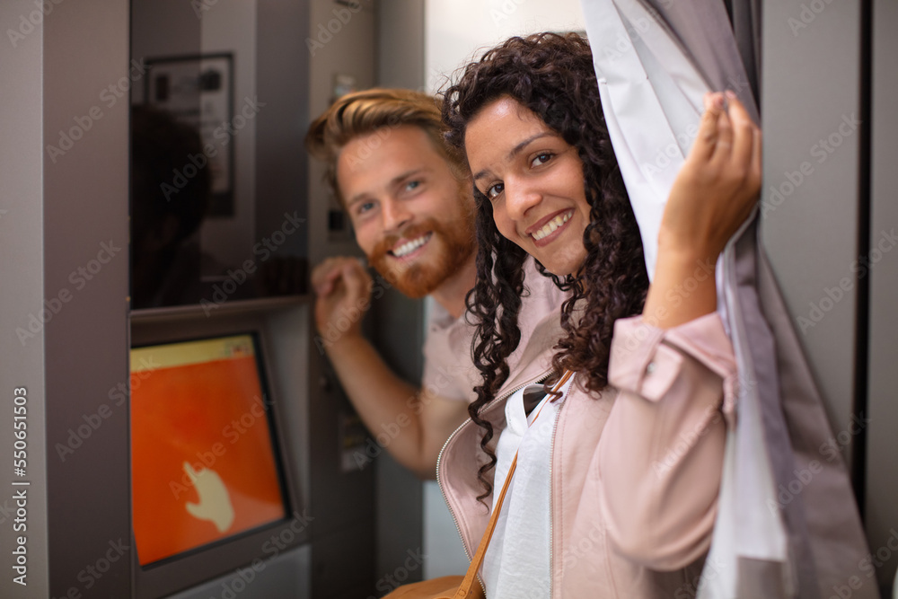 couple makes the portrait inside photo booth Stock Photo | Adobe Stock